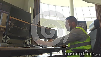 Road Service Dispatcher Work with Computer Inside Modern Control Room ...