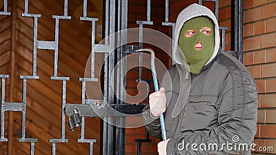 Robber with Crowbar Near the Gates Stock Video - Video of risk, crime ...