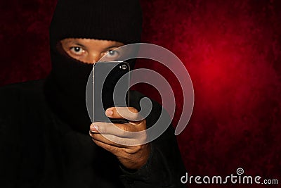 Robber With Smartphone Stock Photo - Image: 59307198