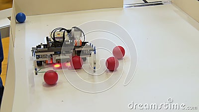 Robot collecting balls. stock footage. Video of school - 101153902