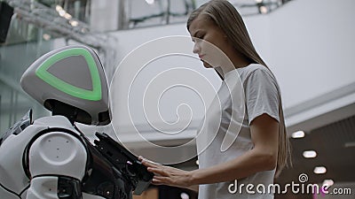 The Robot Looks at the Girl. Artificial Intelligence. Modern Robotic ...