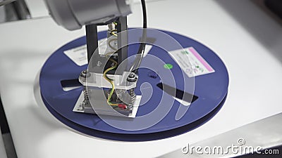 The Robot Sticks a Label on the Reel of Components. Automatic Labeling ...