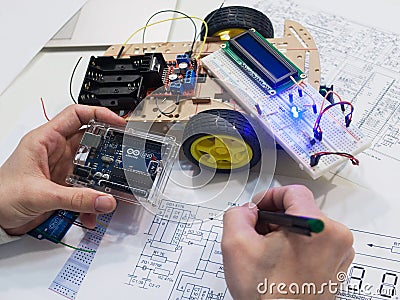 Robotics Creation With Arduino Uno Microcontroller Editorial Image | CartoonDealer.com #104079414