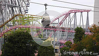 Roller Coasters, Rotating Ferris Wheels, and Gondolas are Fun Stock ...