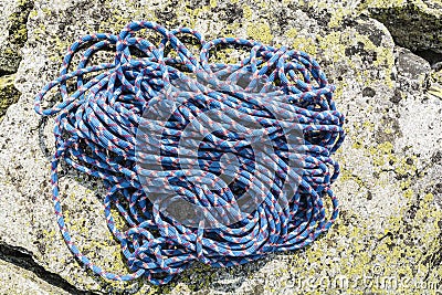 Dynamic Rope, Helmet, Carabiners, Climbing Harness and Descender on the ...