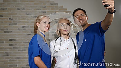 Daily Routine of Doctors. Three Medical Workers Making Selfie Together ...