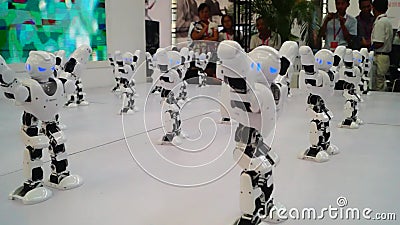Two Robots Dancing. Smart Robotic Technology. Closeup of Smart Robots ...