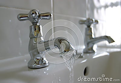 Running Water Bathroom Taps Stock Photos - Image: 103773