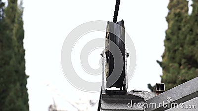 Rustic Cable Car Pulley Wheel Rolling Along a Steel Cable Stock Footage ...