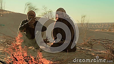 Sahara men near a fire stock footage. Video of nature - 62969986