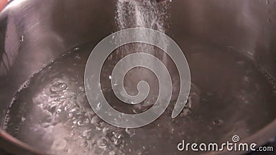 Salt is Poured into a Pot of Boiling Water Stock Footage - Video of ...