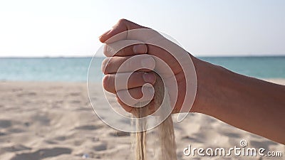 Sand falling out of hand stock footage. Video of time - 258907368