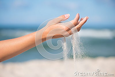 Sand Falling From The Woman's Hand Stock Images - Image: 32776014