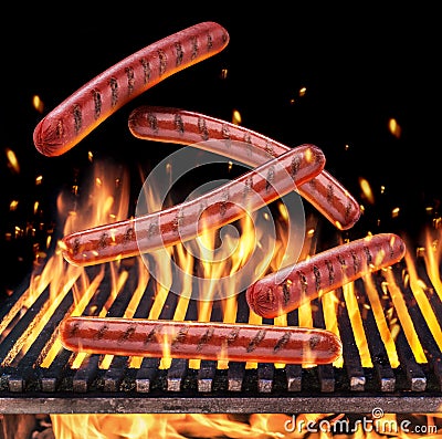 Sausages Falling On The Burning Grill Grate And Tongues Of Fire Flame ...