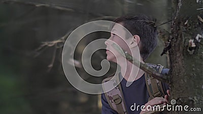 Scared Boy in Dark Forest Hiding Behind a Tree, Slow Motion, Outdoors ...