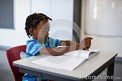 School Boy Memorizing The Lesson In Classroom Royalty-Free Stock ...