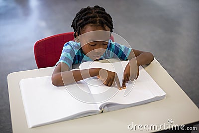 School Boy Memorizing The Lesson In Classroom Stock Image ...