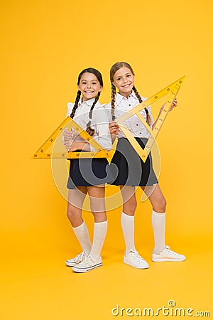 School Students Study Geometry. Pupil School Girls Big Rulers. School ...