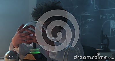 Schoolboy Experimenting in Physics Class. Young Student Doing Physics ...