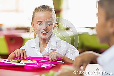 Schoolgirl Having Lunch During Break Time In School Cafeteria Royalty ...
