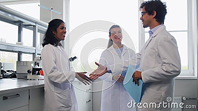 Scientists Shaking Hands in Laboratory Stock Video - Video of deal ...