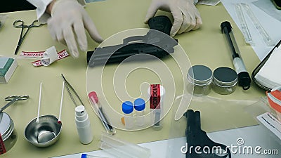 Scientific Police Opens Evidence Bag with Gun for Analysis Stock Video ...
