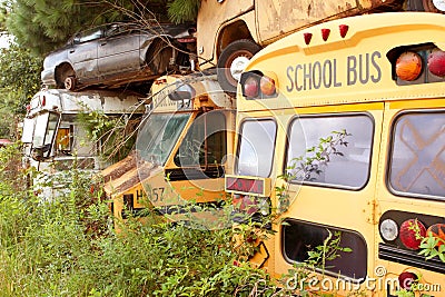 Scrapped School Buses Sit In Auto Junkyard Stock Photo - Image: 34387630