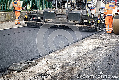 Screed Of Asphalt Paver Makes Smooth Asphalt Mat - Road Reconstruction ...