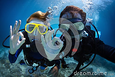 Good Looking Woman Diving Under the Sea Stock Image - Image of suit ...