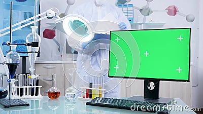 In Secure Laboratory A Desk With Green Screen PC Monitor Stock Video ...