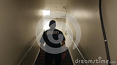 Security Person Climbing the Stairs - Shot from the Back Stock Footage ...