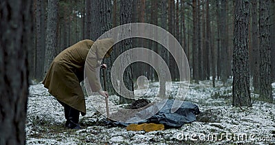 Serial Killer Digs a Grave in the Woods To Hide the Corpse Stock Video ...