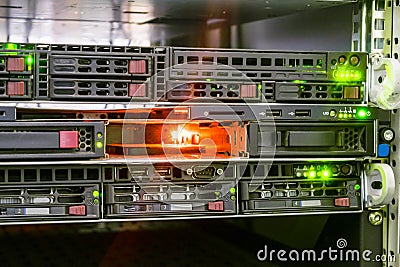 A Server With Multiple Hard Drives Works In A Data Center Rack. A Place ...