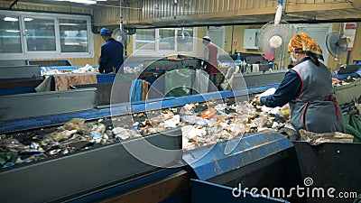 People Work at a Garbage Factory, Recycling Plant. Stock Footage ...