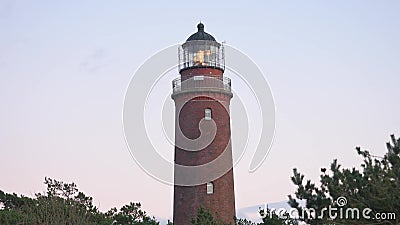 Shinning Old Lighthouse With Dark Clouds After Sunset In Background ...