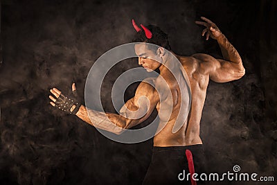 Shirtless Muscular Male Bodybuilder Dressed With Devil Costume Stock ...