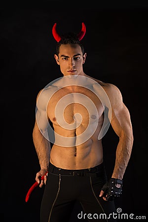 Shirtless Muscular Male Bodybuilder Dressed With Devil Costume Royalty ...
