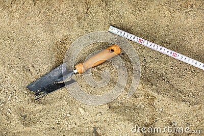 Shovel In The Sand.Skeleton And Archaeological Tools.Digging For ...