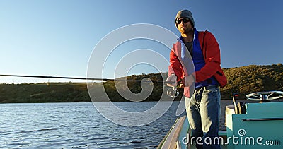 Man fishing in river 4k stock video. Video of activity - 125605067
