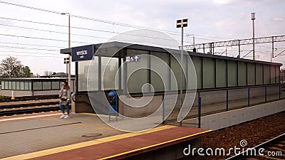 Side View from the Train Passing by Railway Station Stock Footage ...