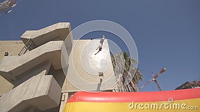 Side View Of Unrecognizable Man Jumping From High Building And Falling ...