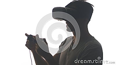 Silhouette of Young Man Playing Game in Vr Glasses. Guy Gets Experience ...