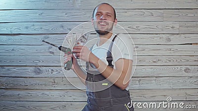 Dancing Construction Worker with Money and Drill in His Hand Stock ...