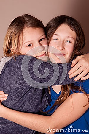 Sisters Hugging Stock Photo | CartoonDealer.com #49348254