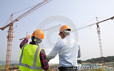 Site Manager And Construction Worker Checking Plans Royalty Free Stock ...