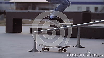 A Skater Jumps Over the Rail on the Skate Park Stock Footage - Video of ...