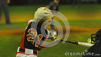 Slow Motion of Batter Hitting Ball and Running To First Base at ...