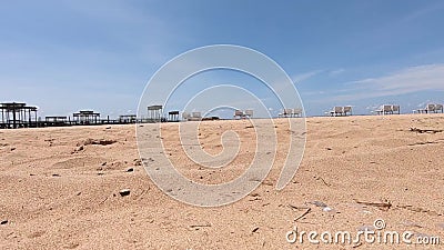 Slow Motion of Clumps of Sand Falling from the Blue Sky Onto the Beach ...