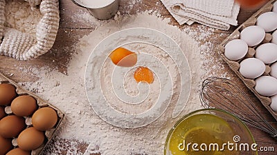 Slow Motion of Falling Eggs into Flour - Top View Stock Video - Video ...