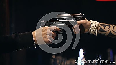 SLOW MOTION: Two Male Hands with Guns Take Aim at Each Other Stock ...
